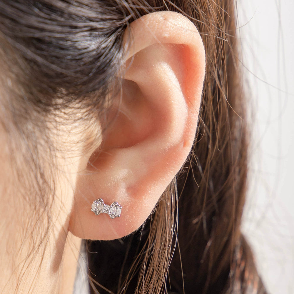 Wholesale Women's Titanium Steel Bow Ear Nails With Zirconia Design Li ...