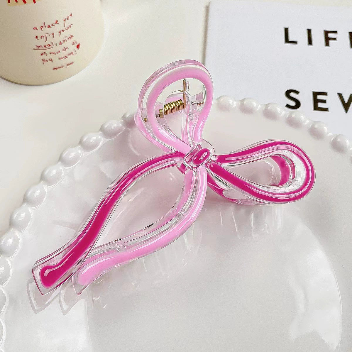 Women's Plastic And Resin Bow Grip Hair Clip With Dripping Oil Design ...